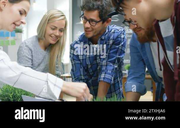 Team of Young Creative Developers Have Brainstorming Session at their ...