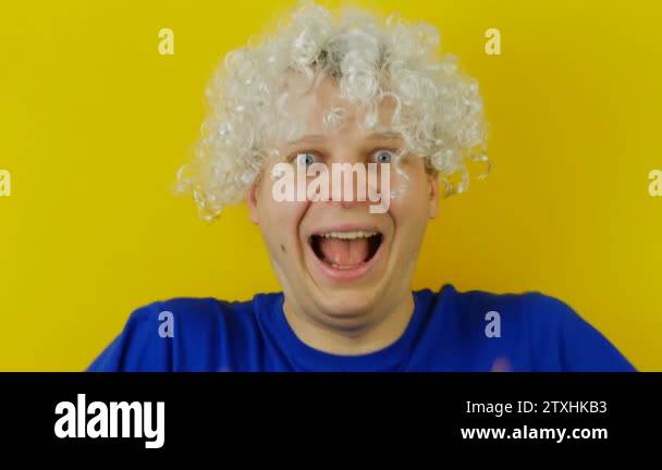 curly screaming man with white hair, thumbs up, funny and cheerfully ...
