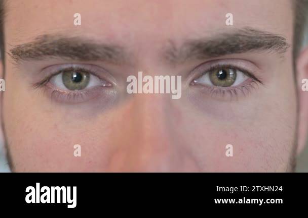 Close Up of Young Man Blinking Eyes in Camera Stock Video Footage - Alamy