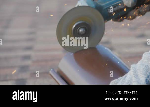 Installation of drainage system of a private house. Metal cutting, hand ...