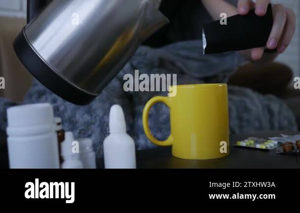 Medicine powder falling down in glass with water. Flu Medicine Powder ...