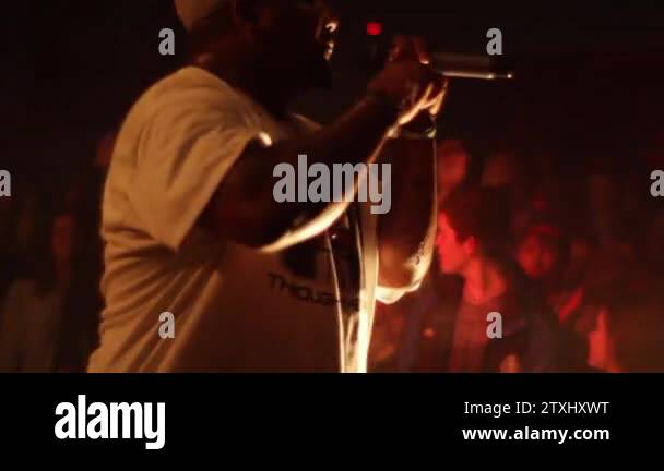 Belarus, Bobruisk, 20.10.2016 A rap rock concert. Black male rapper ...