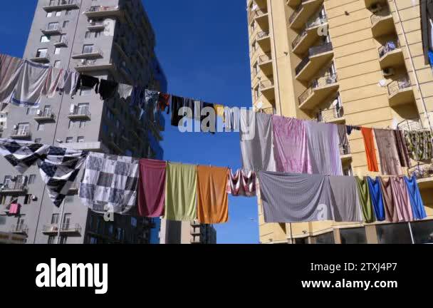 Washing line hanging between buildings Stock Videos & Footage - HD and ...