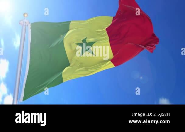 Senegal animated flag in the wind with blue sky in the background ...