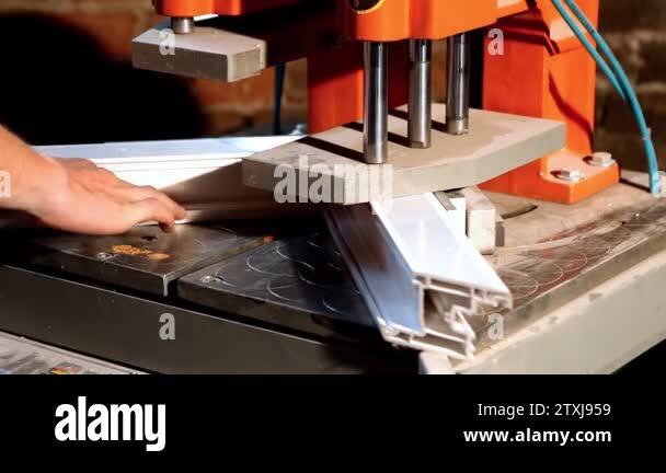 Welding plastic corners of window frame Stock Video Footage - Alamy