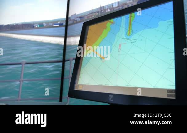 Large ship control screen with a grid and a map on it on a floating ...