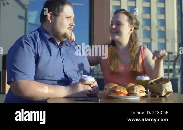 Couple fat woman Stock Videos & Footage - HD and 4K Video Clips - Alamy