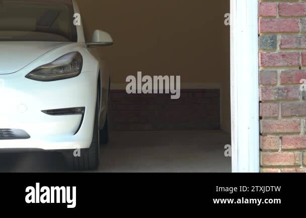 A brand new white Tesla Model 3. The model 3 is set to be the Teslas ...