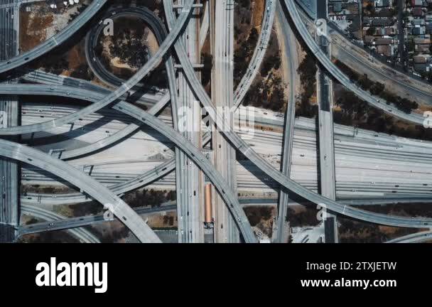 Drone top view of epic highway junction interchange with traffic moving ...