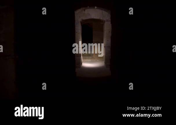 Pass through a long and dark Roman basement. Basement under the ...