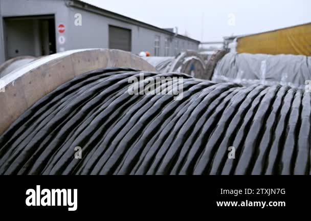 The manufacture of ropes. A bunch of ropes. High voltage cable reel ...