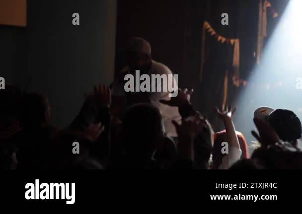 Belarus, Bobruisk, 20.10.2016 A rap rock concert. Black male rapper ...