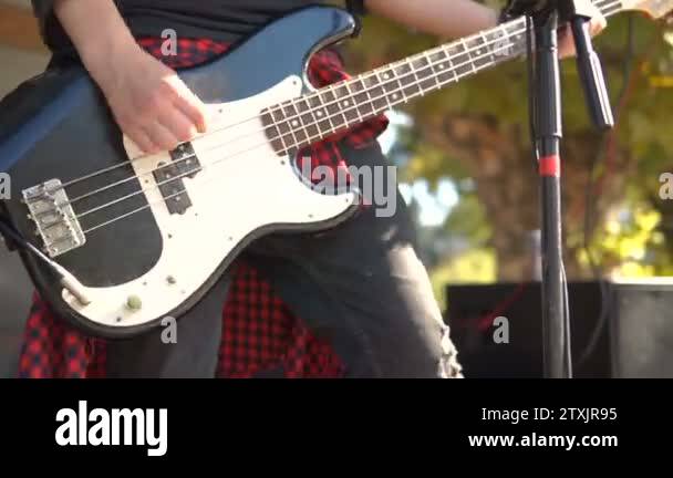 Guitars in live action at a concert. Concert rock band performing on ...