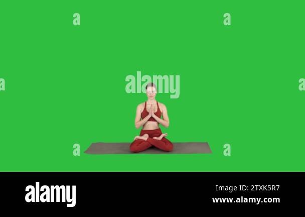 Young sporty woman practicing yoga, doing Scale exercise, Tolasana pose ...