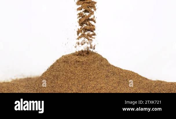 Green pepper, piper nigrum, spice falling on white background, slow ...