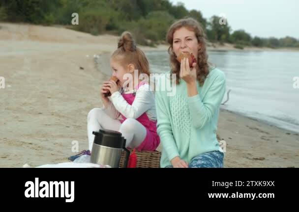 Mother And Daughter Fry Meat And Vegetables On A Barbecue On The Beach On The Beach Stock Video