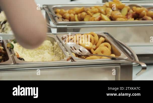 People group catering buffet food indoor in luxury restaurant with meat ...