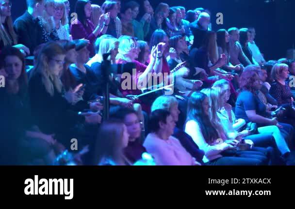 People viewers in a TV studio while recording a TV show Stock Video ...