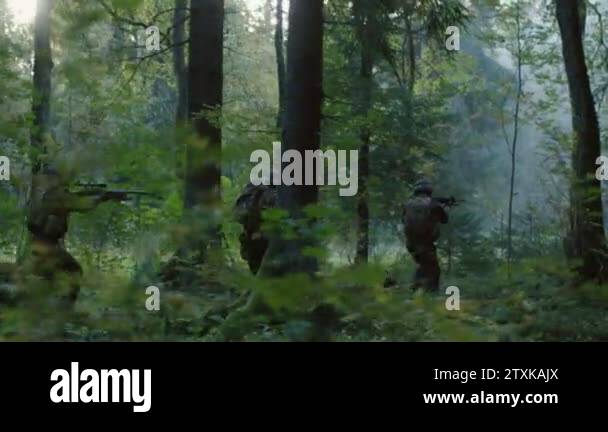 Fully Equipped Soldiers Wearing Camouflage Uniform Attacking Enemy ...