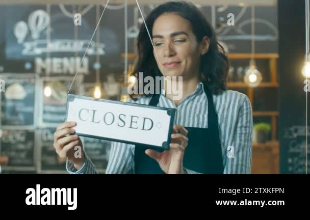 Beautiful Young Cafe Owner Flipping Storefront Sign From Close to Open ...