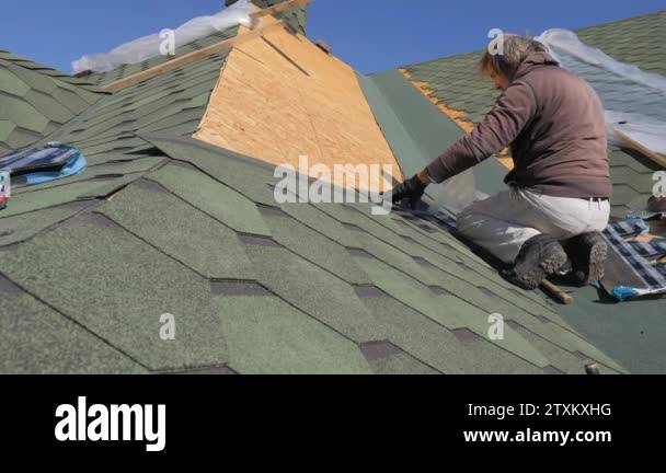 Roof shingles installation Stock Videos & Footage - HD and 4K Video ...