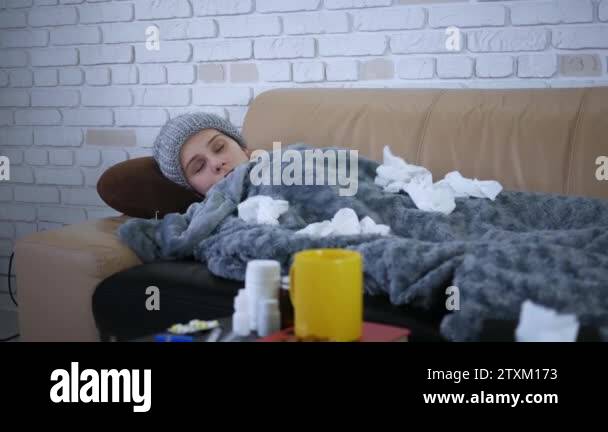 Young caucasian woman get a cold and feel better after treating colds ...