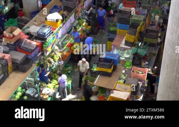 Unidentified people at the Mercado Municipal de Chacao market in the ...