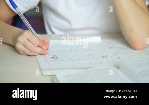 Bored schoolgirl day drawing at home. Girl tired of doing lessons ...