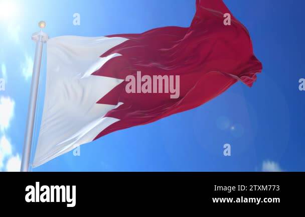 Bahrain animated flag in the wind with blue sky in the background ...