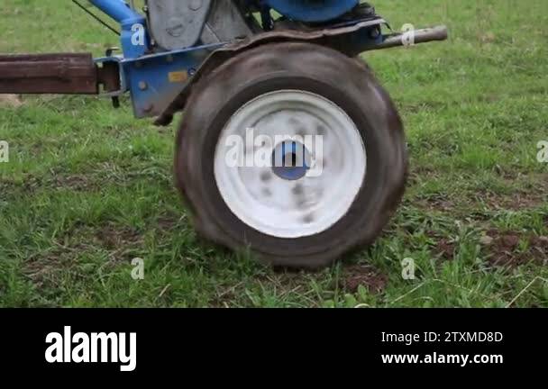 Wheel tractor Stock Videos & Footage - HD and 4K Video Clips - Alamy