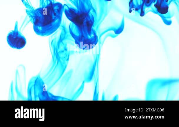 Blue food color ink drop in water on white background. Abstract food ...