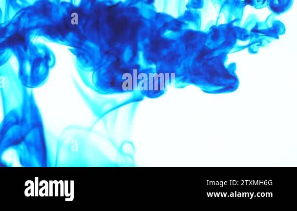 Blue food color ink drop in water on white background. Abstract food ...