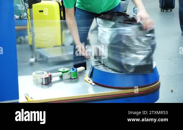 Safe wrap luggage wrapping service security Stock Videos & Footage - HD ...