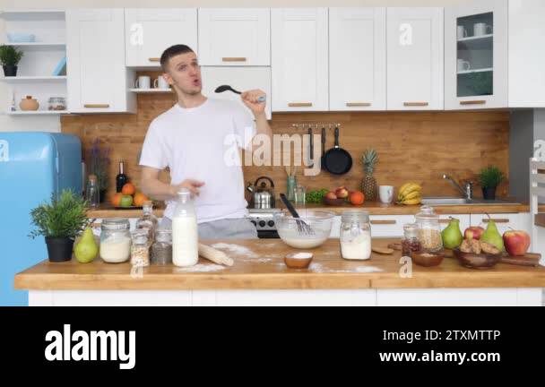 Guy cooking in the kitchen Stock Videos & Footage - HD and 4K Video ...