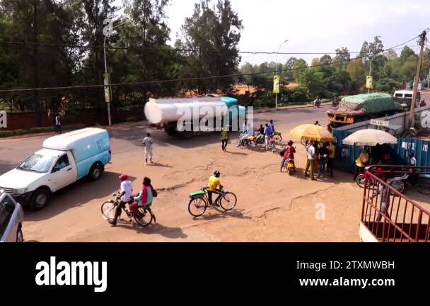 Road traffic on Nyanza Road, in the Kicukiro district of Kigali, the ...