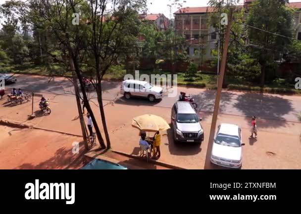 Road traffic in the Kicukiro district of Kigali, the capital of Rwanda ...
