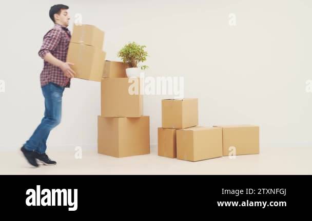 Man carrying heavy awkward Stock Videos & Footage - HD and 4K Video ...