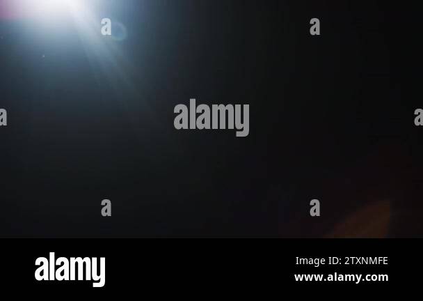 White Light Shines Making Colorful Reflection Opposite, Particles ...