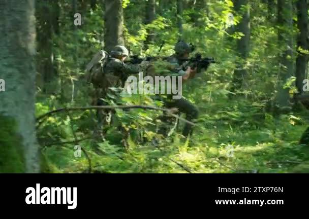 Squad of Five Fully Equipped Soldiers in Camouflage on a Reconnaissance ...