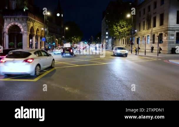 LONDON - SEPTEMBER 10, 2019: Traffic crossing a busy intersection at ...