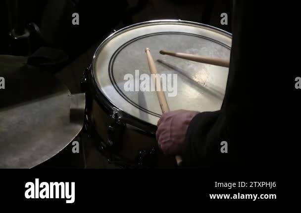 Drum sticks hit on the snare drum in black background Stock Video ...