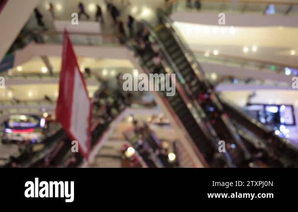 abstract blur background of shopping mall and crowd of walking people ...
