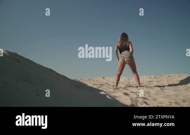 Young Cute Girl Dancing Twerk At The Beach Tanned Woman Moves Her Butt