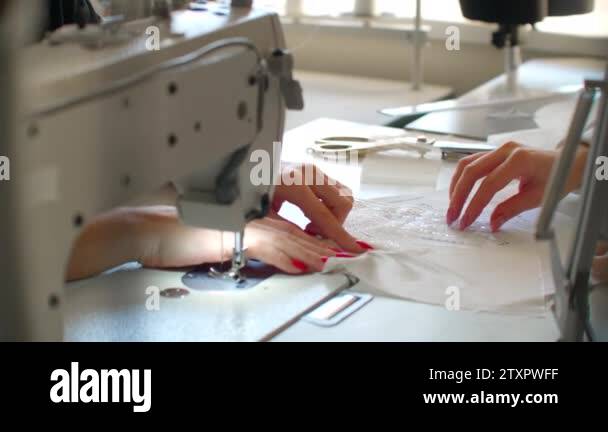 designer of clothes makes an outline of clothes with a felt-tip pen ...