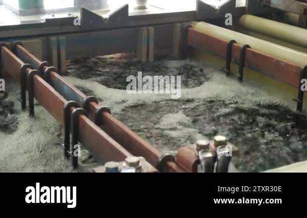 Galvanic bath, Engineering production. Circuit board in galvanic bath ...