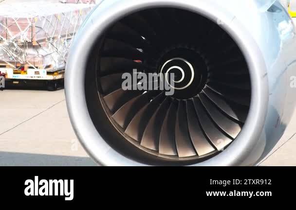 Airplane turbo engine blades fan on the right wing and test moving ...
