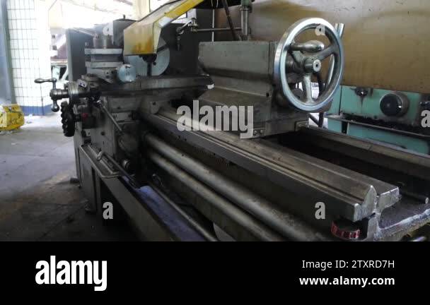 Old turning lathe machine. The old factory building prior to demolition ...