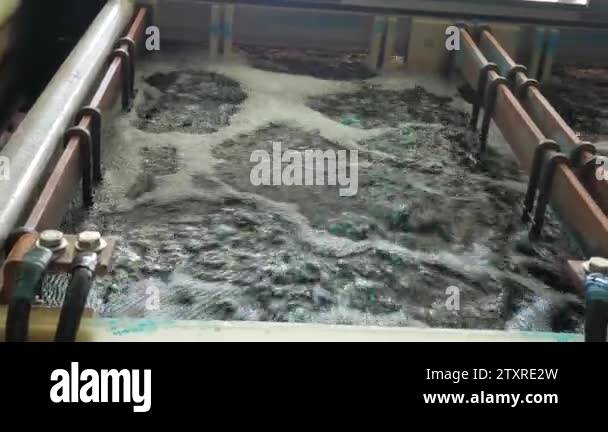 Galvanic bath, Engineering production. Circuit board in galvanic bath ...