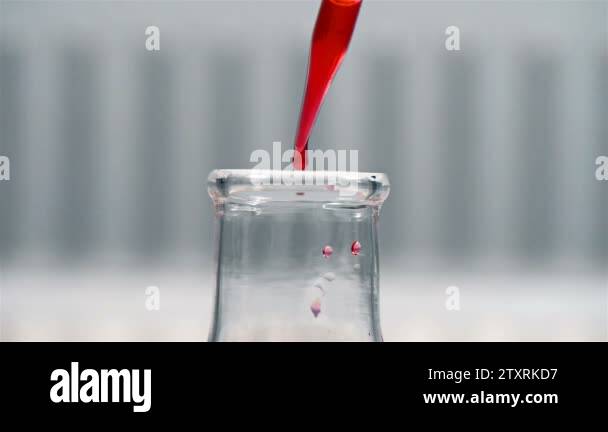 Pipette dropping red sample flask Stock Videos & Footage - HD and 4K ...