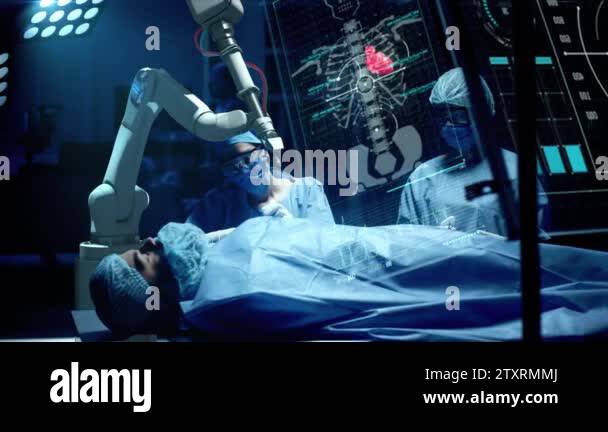 Team of surgeons perform a delicate operation using medical surgical ...